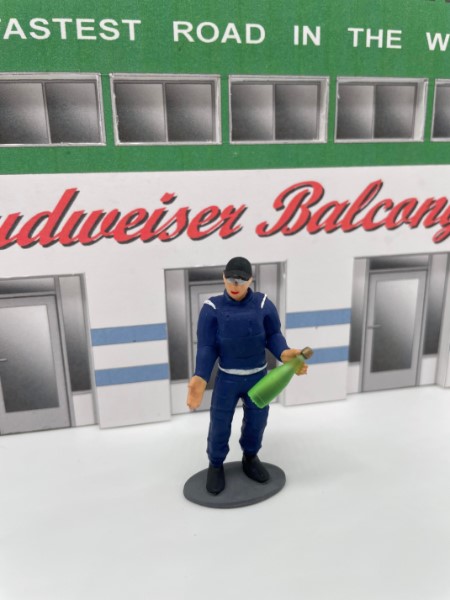 F713 – Greenhills 1.32 Scale Racing Driver & Champagne Bottle for ...